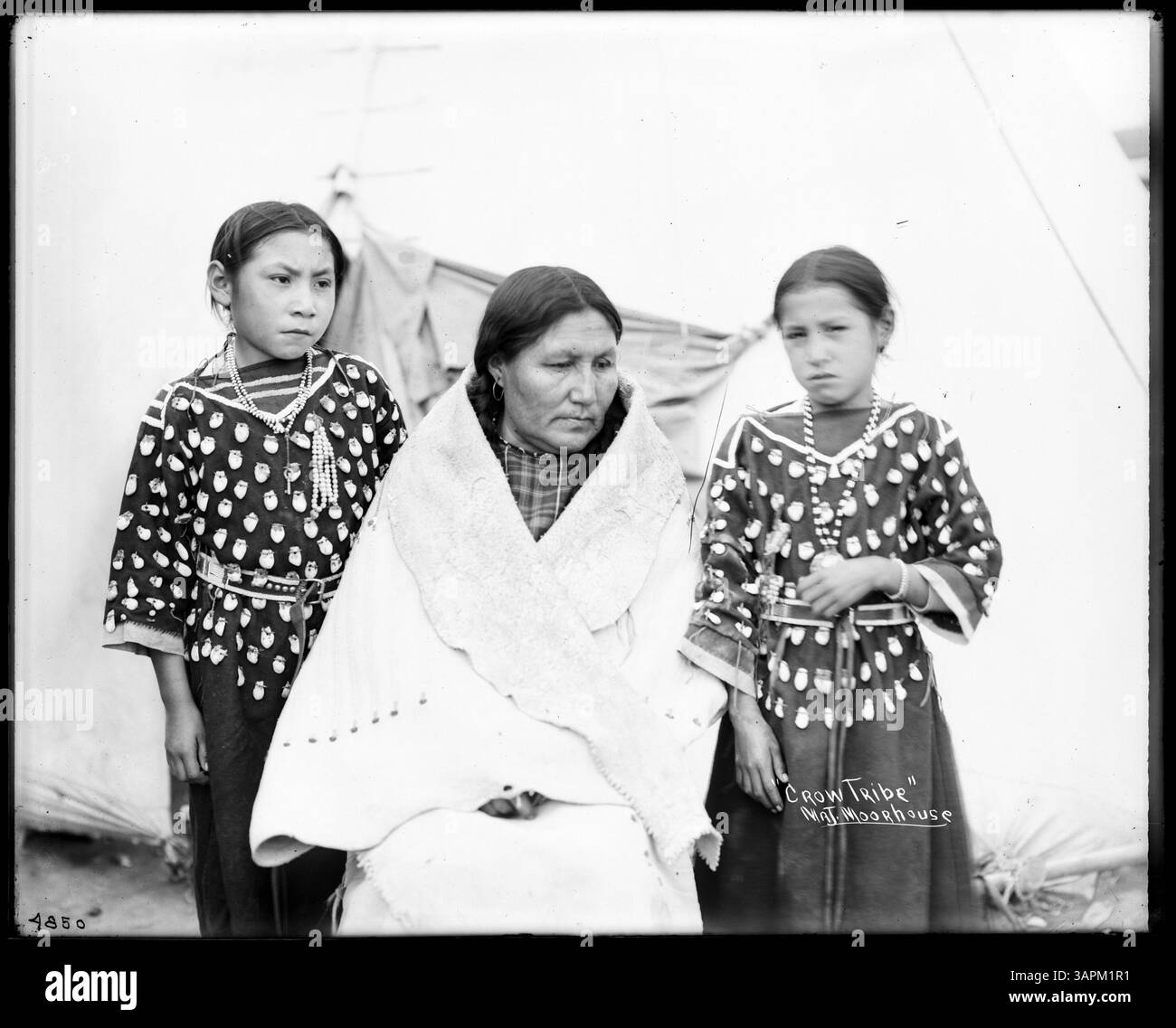 This photograph by Lee Moorhouse shows Crow Indian women in regalia ...