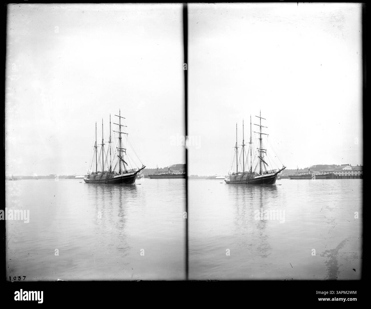 A photograph of the 'James Tuft,' a four-mast bark ship carrying a load ...