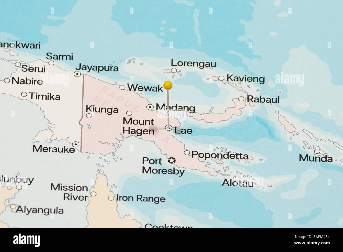 macro photo of a yellow pin needle into lae city of Papua New Guinea ...