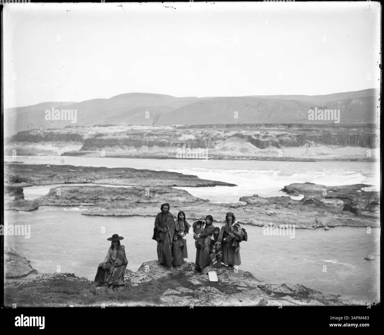 This photograph shows a tribal family, capturing a moment of Native ...