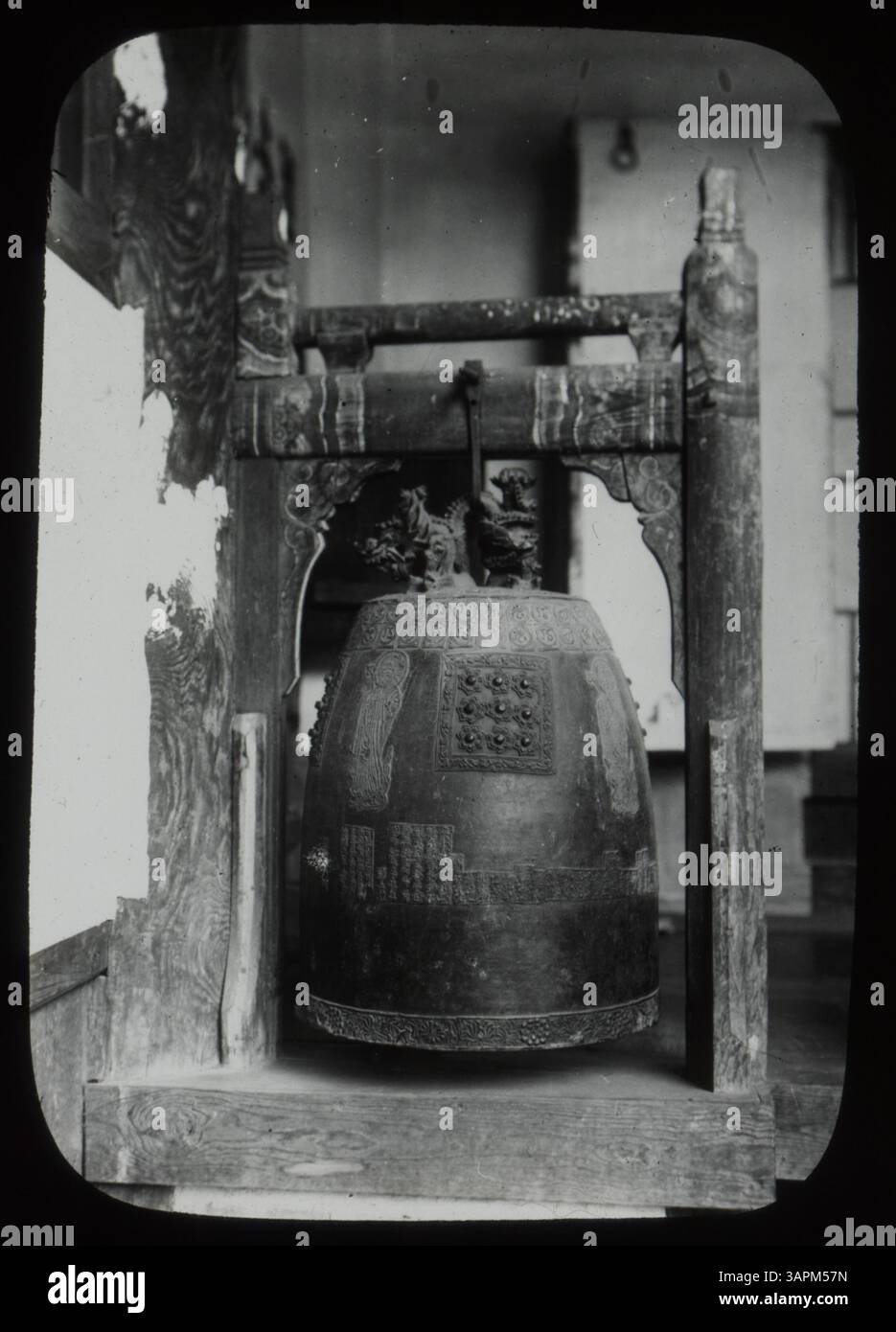 A 1917 photograph by Gertrude Bass Warner showcasing a bell in Pongeum ...
