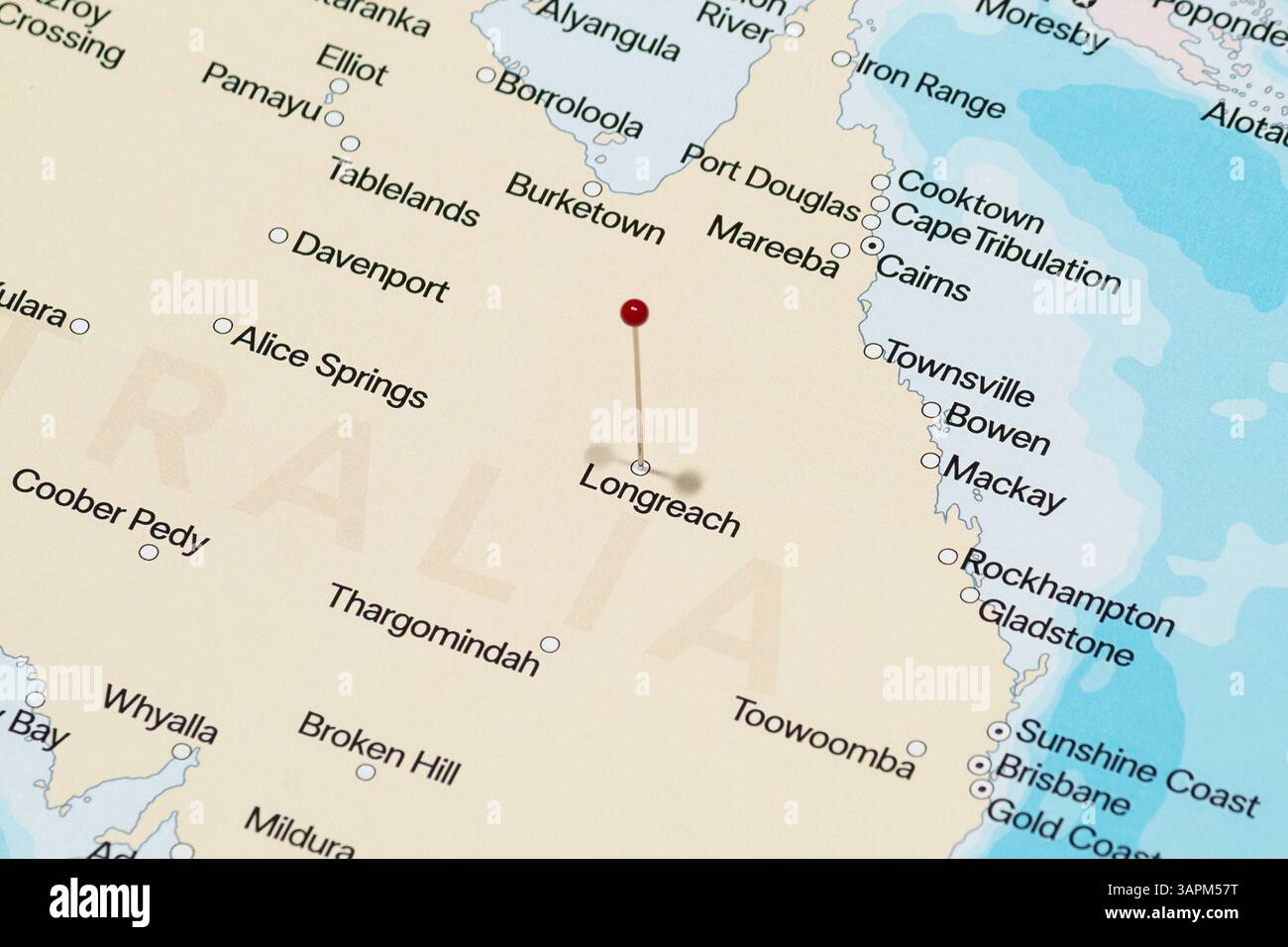 macro photo of a red pin needle into longreach city of australia ...