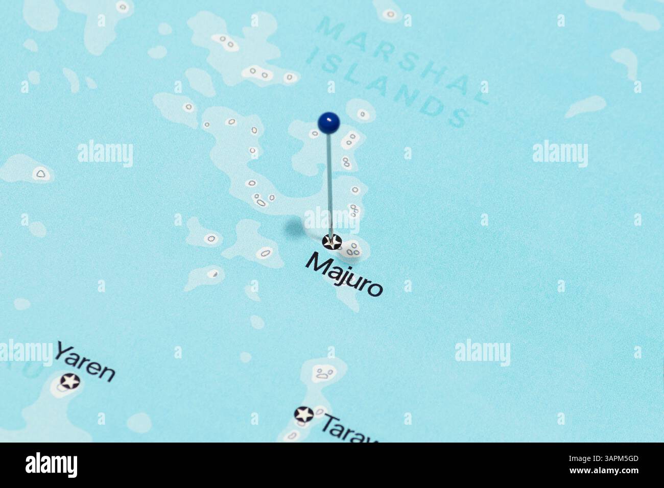 macro photo of a blue pin needle into majuro city of marshall islands political map Stock Photo ...