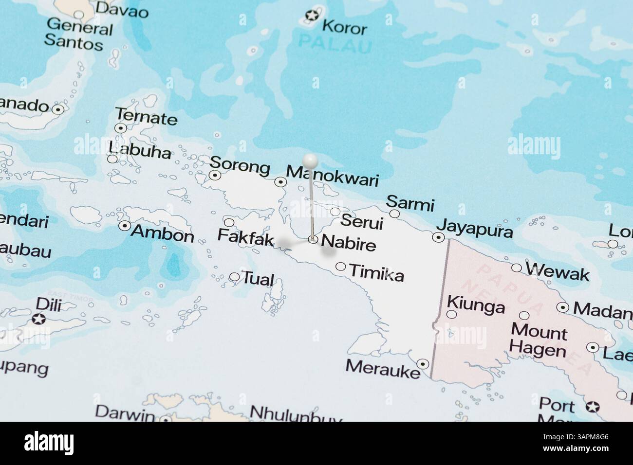 macro photo of a white pin needle into Nabire city of Indonesia ...