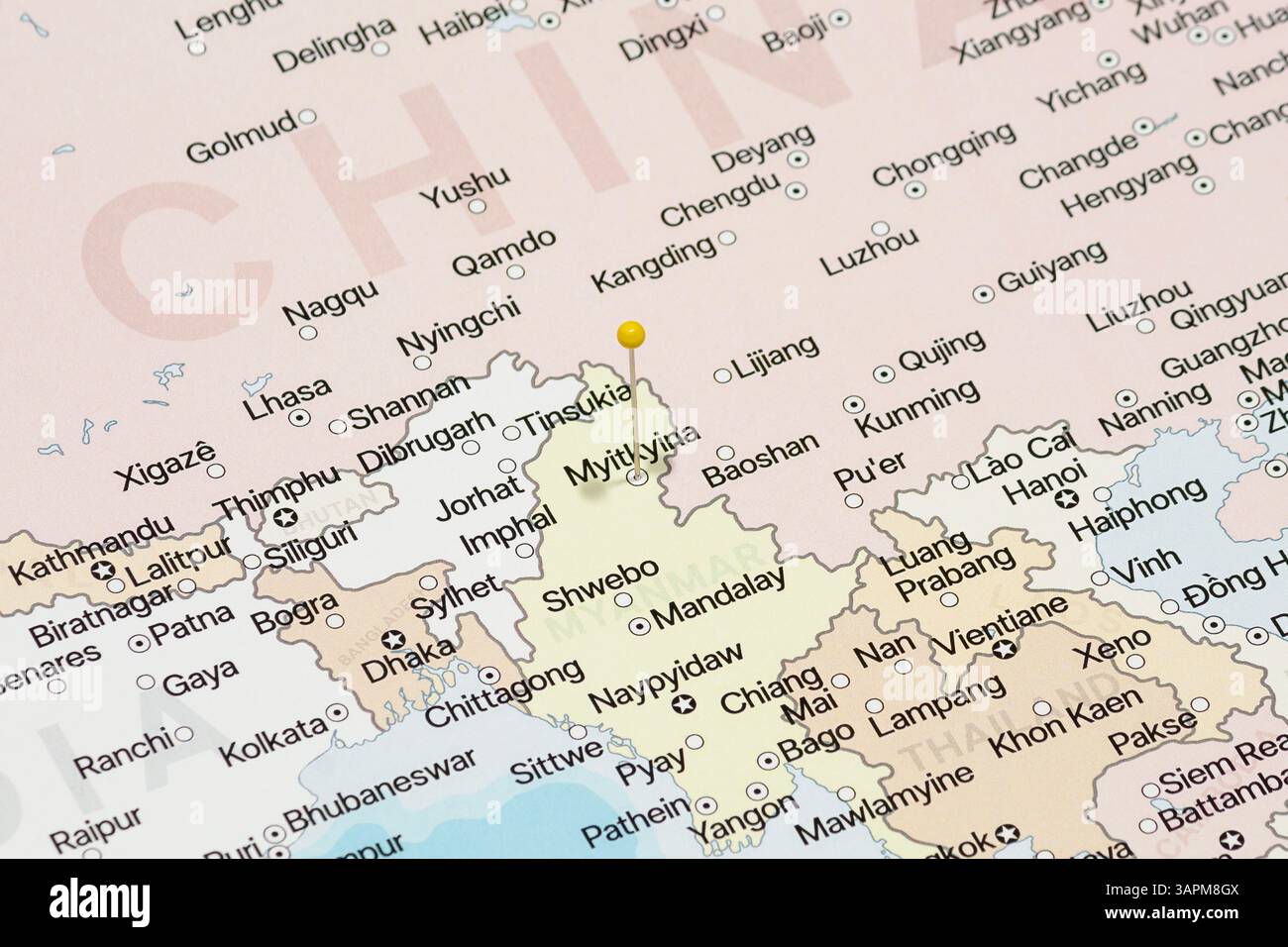 macro photo of a yellow pin needle into Myitkyina city of Myanmar ...
