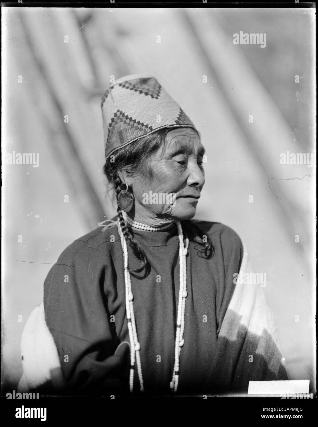 A portrait of an aged Native American woman, captured by Lee Moorhouse ...