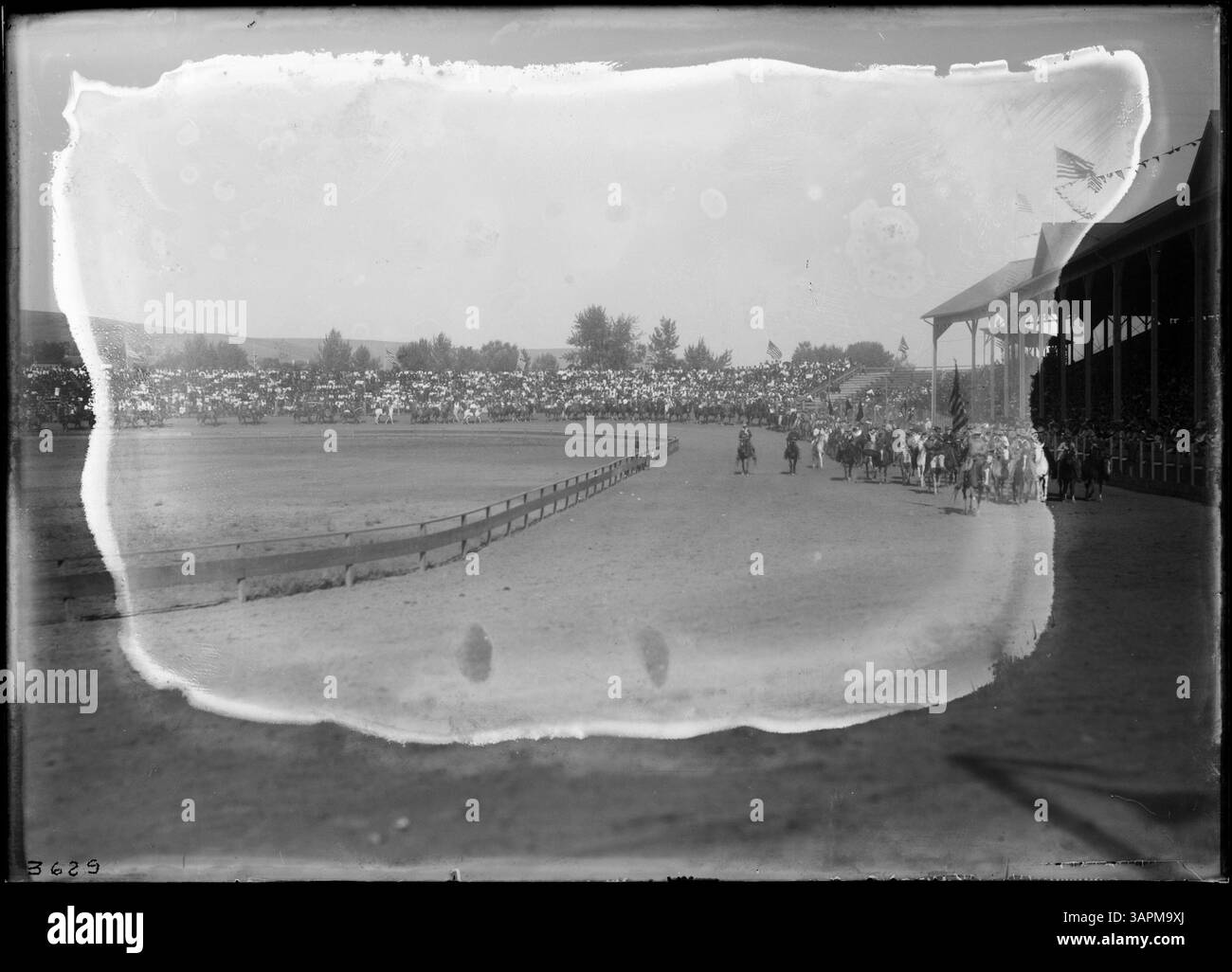 The image shows a grand review at a roundup event, capturing the ...