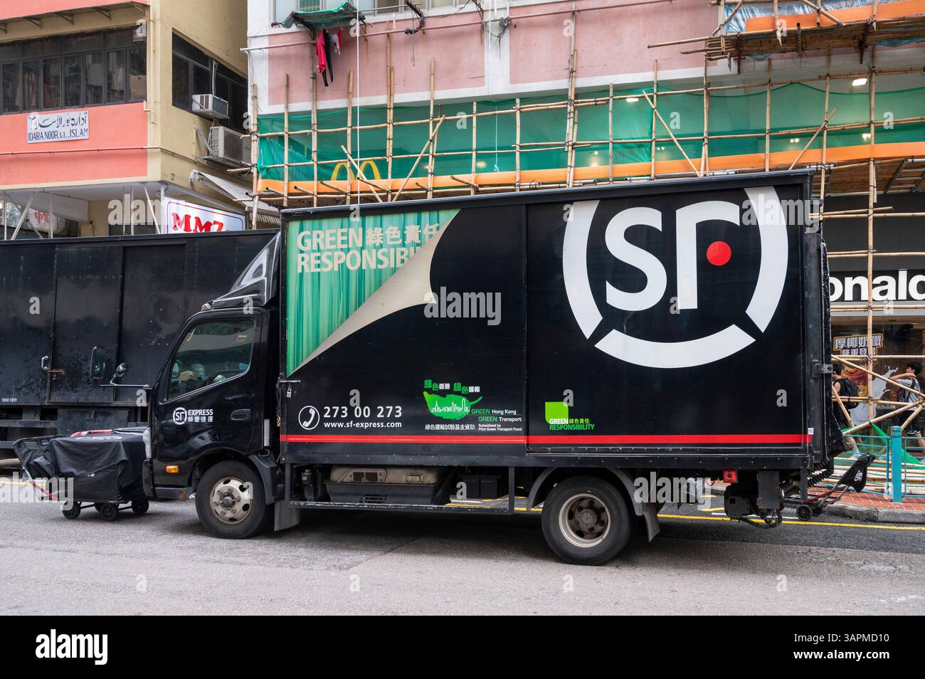 Chinese delivery company SF Express delivery truck is seen stationed in ...