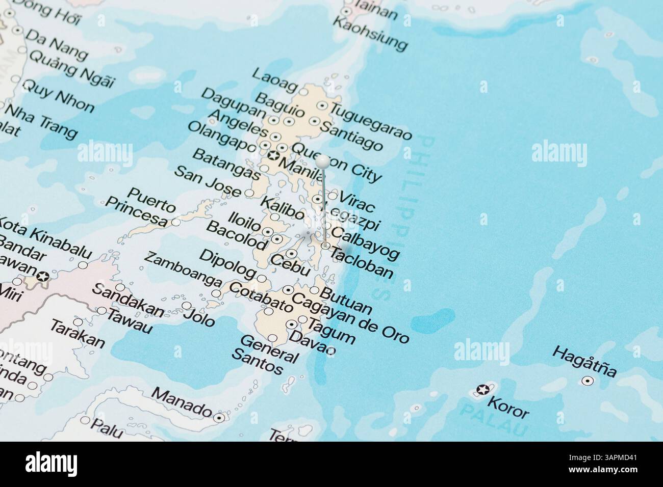 macro photo of a white pin needle into Tacloban city of Philippines ...