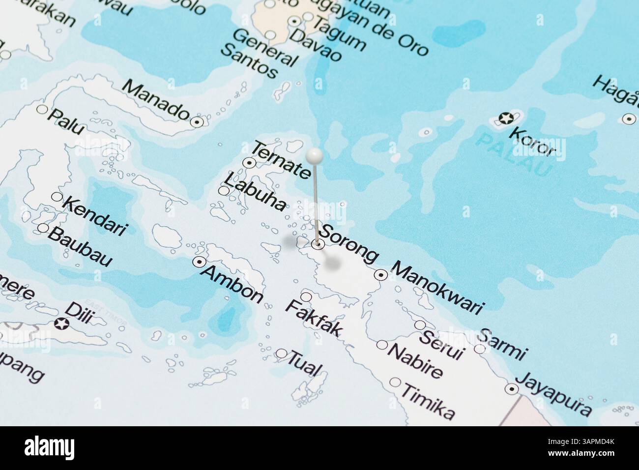 macro photo of a white pin needle into Sorong city of Indonesia ...