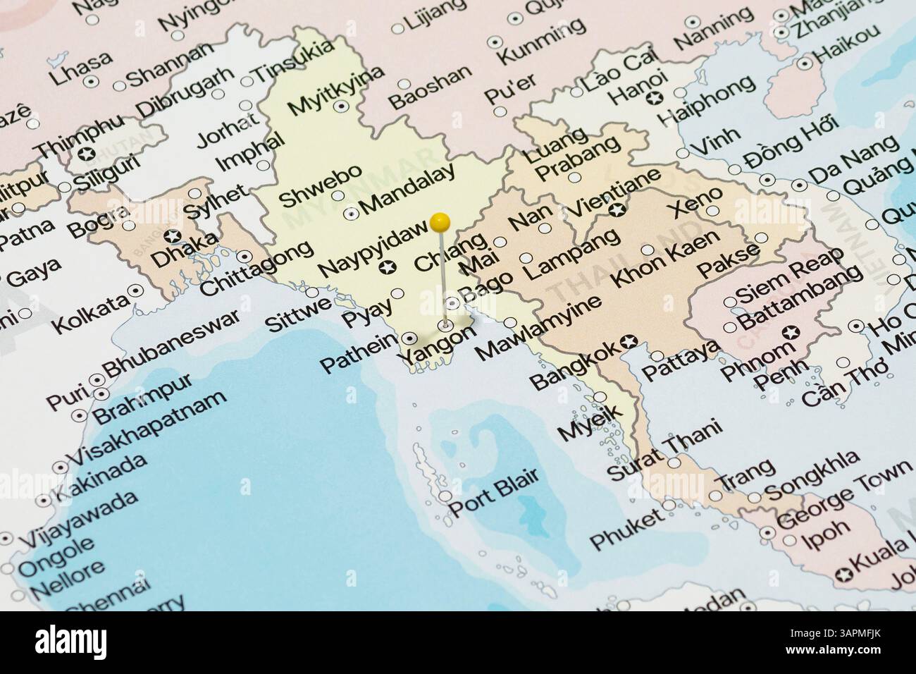 macro photo of a yellow pin needle into Yangon city of Myanmar ...