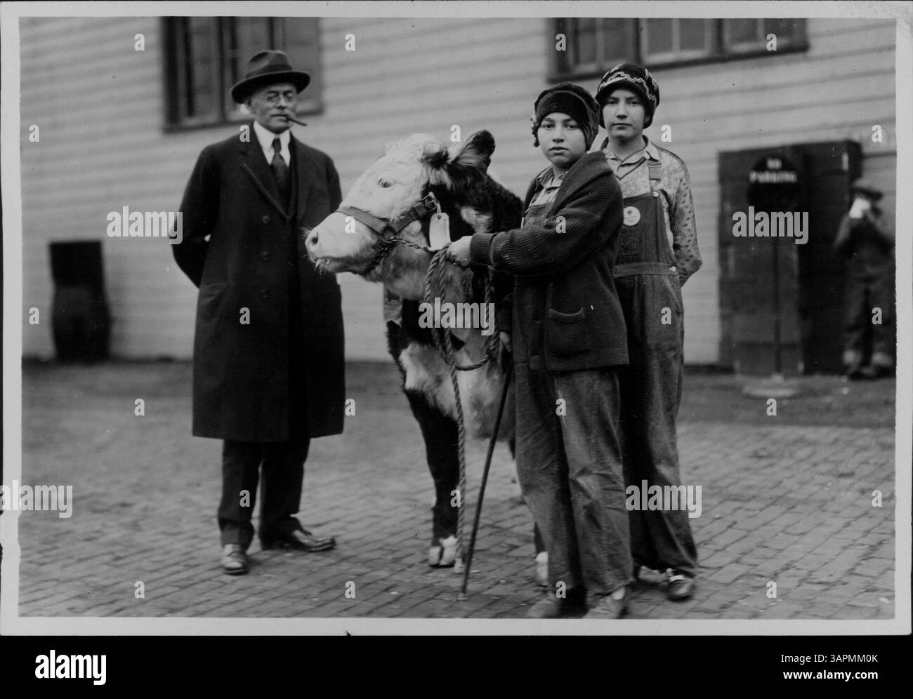 This photograph captures James E. Neville alongside Helen and Agnes ...