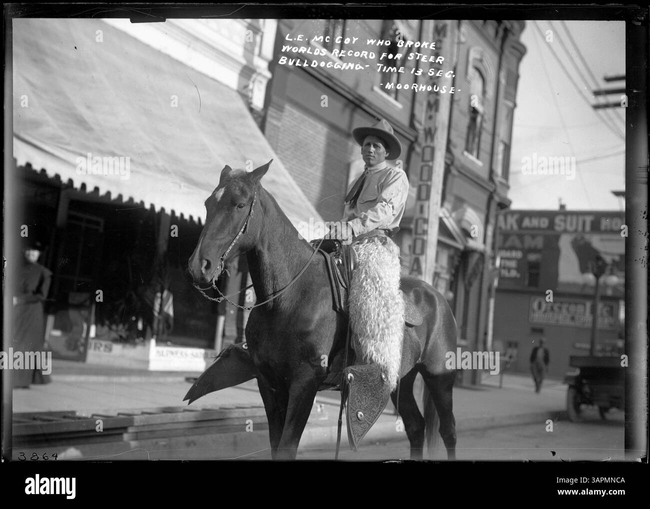 Photograph by Lee Moorhouse of L.E. McCoy, a champion bulldogger ...