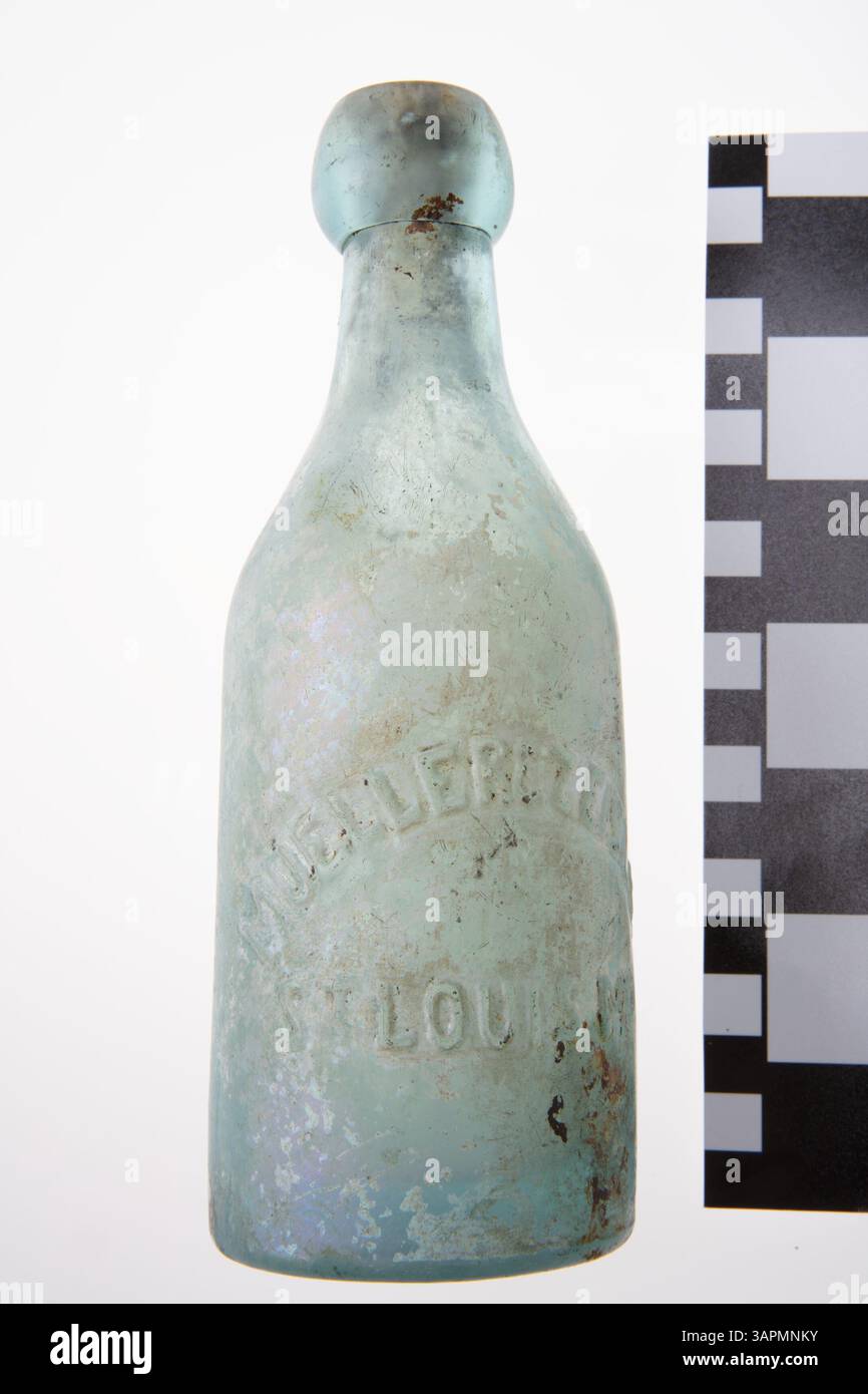 This aqua glass bottle, crafted by Mueller & Zeisler in St. Louis ...