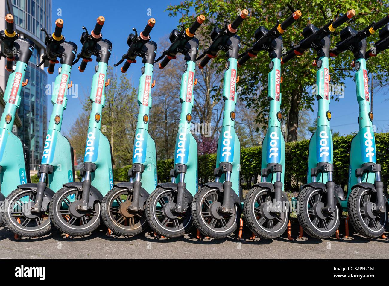 dott electric scooters on sidewalk Stock Photo - Alamy