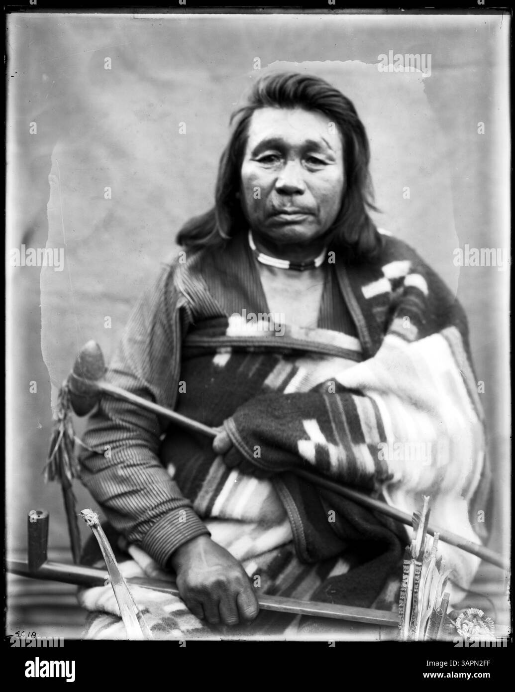 In this photograph, Speel-ye, Coyote of the Walla Walla Tribe, is shown in traditional costume ...