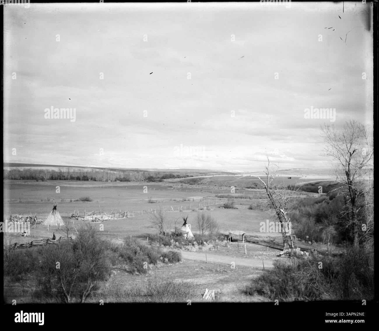 This photograph by Lee Moorhouse shows a scenic view of tipis in the ...