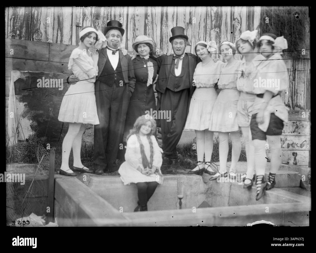 A photo featuring a group of actors and actresses in costume, capturing ...