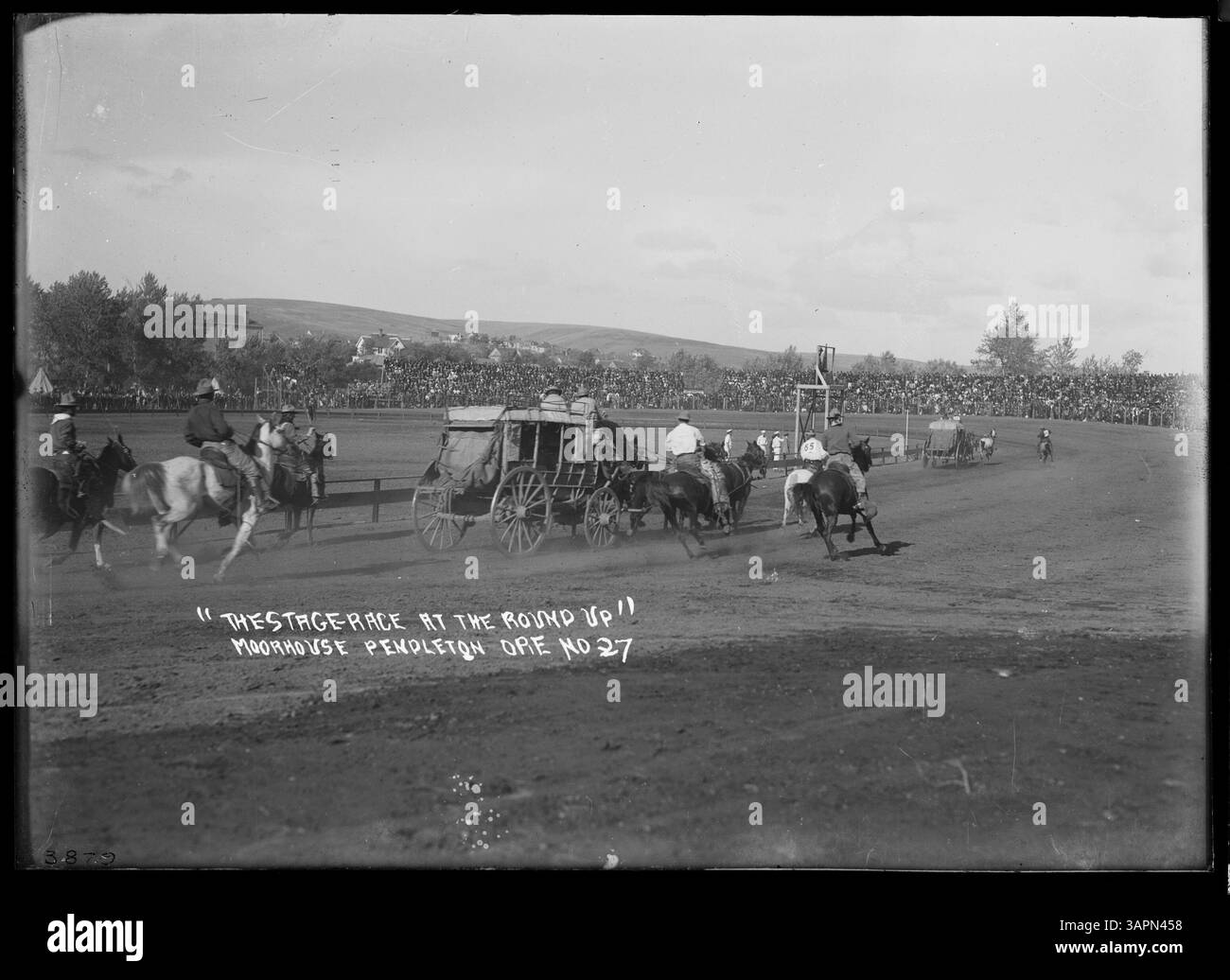 This photograph captures a stagecoach race, offering a glimpse into the ...