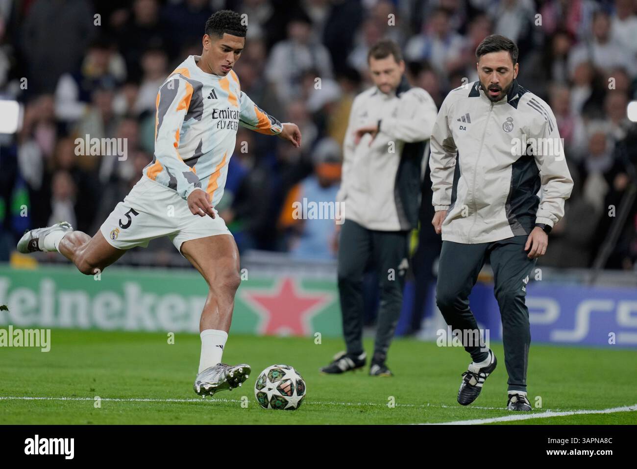 Real Madrid's Jude Bellingham kicks the ball during warm up before the ...