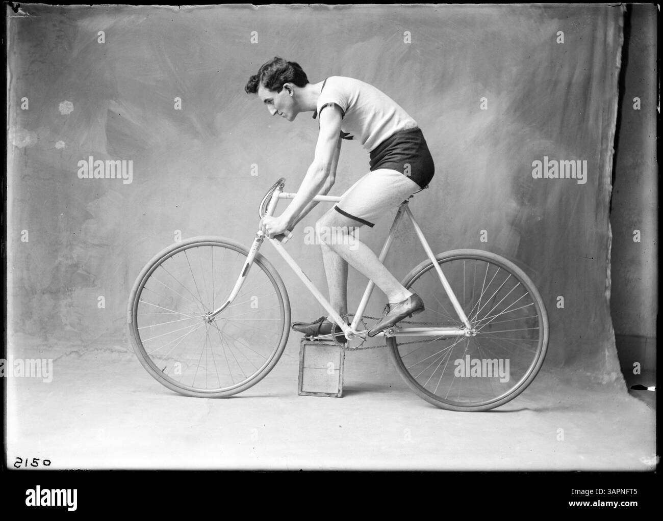 A posed photograph of a bicycle racer on their cycle, showcasing the ...