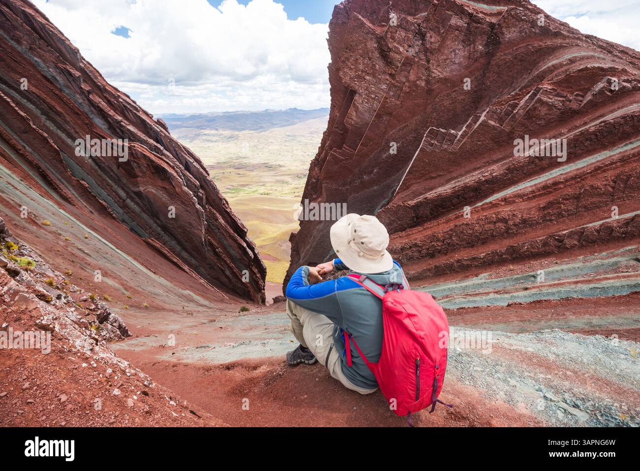 Tourist in surreal Palay Poncho colorful mountains in Peru Stock Photo ...