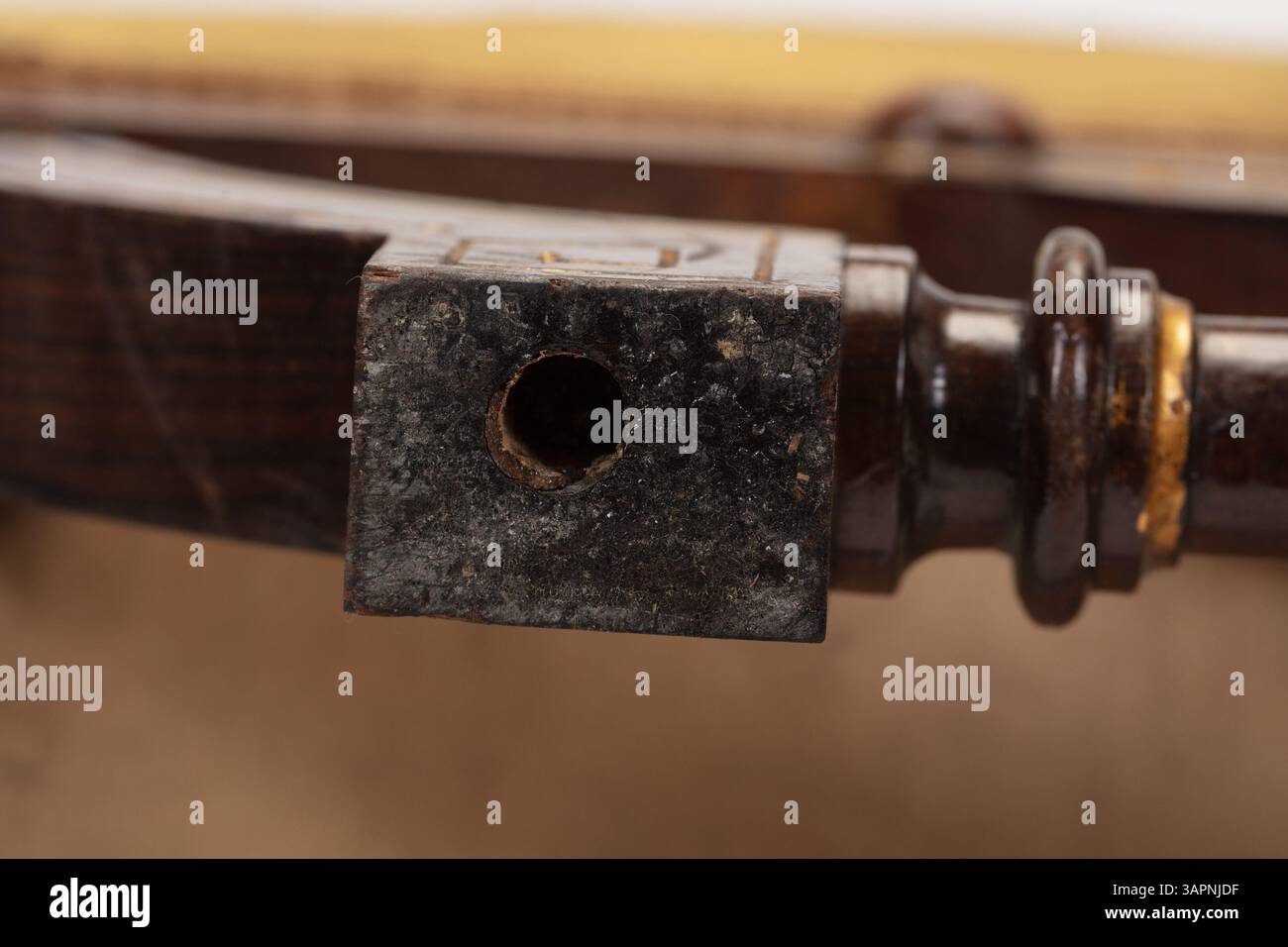 A Victorian-style gold upholstered armchair used as a prop by the ...