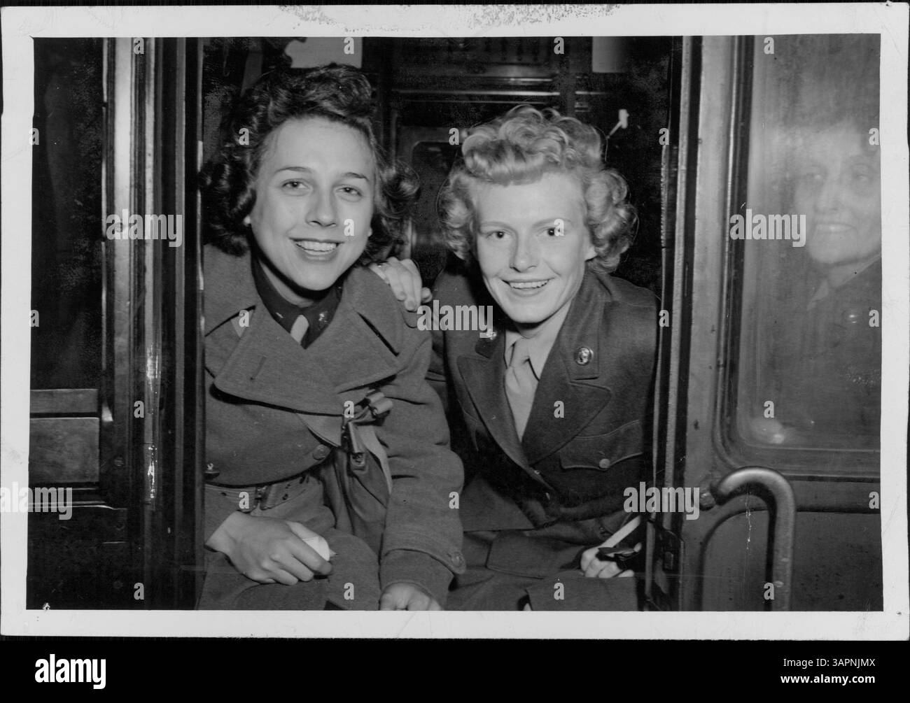 A photograph of Lieutenant Evelyn H. Krefft and Private Betty L. Woods ...