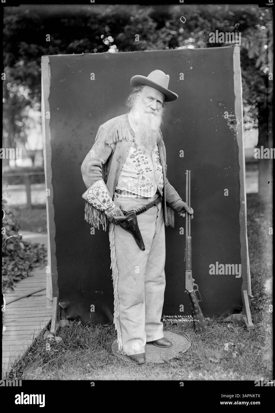 This portrait photograph by Lee Moorhouse depicts Joaquin Miller ...