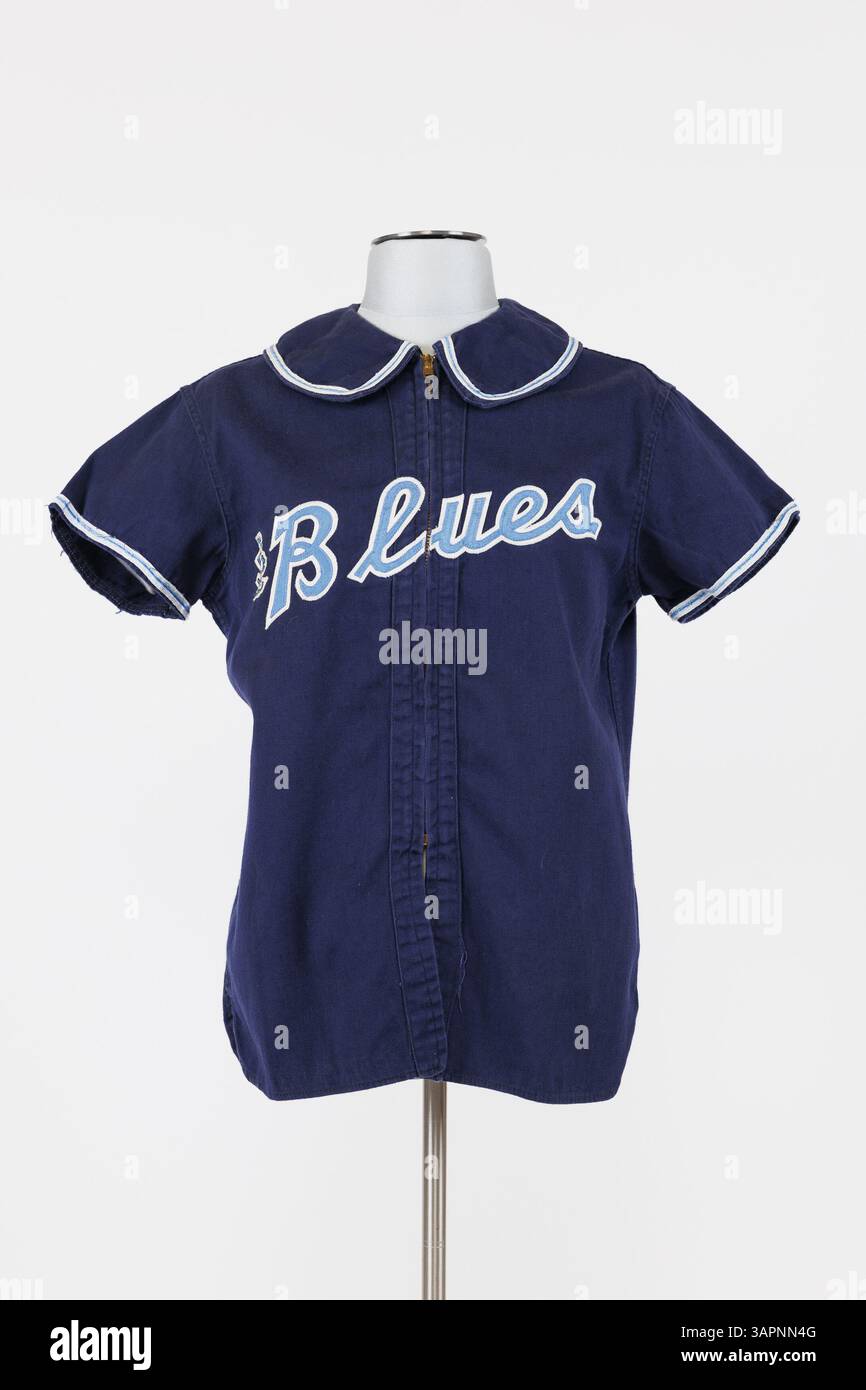 This navy blue softball uniform top was worn by Betty Woods, a lifelong ...