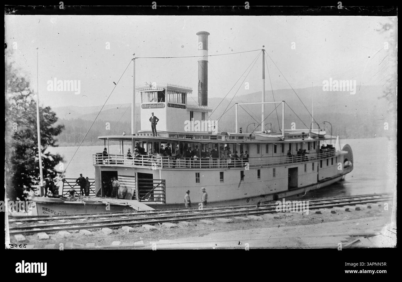 This photograph shows the stern-wheel steamboat 'Regulator' on the ...