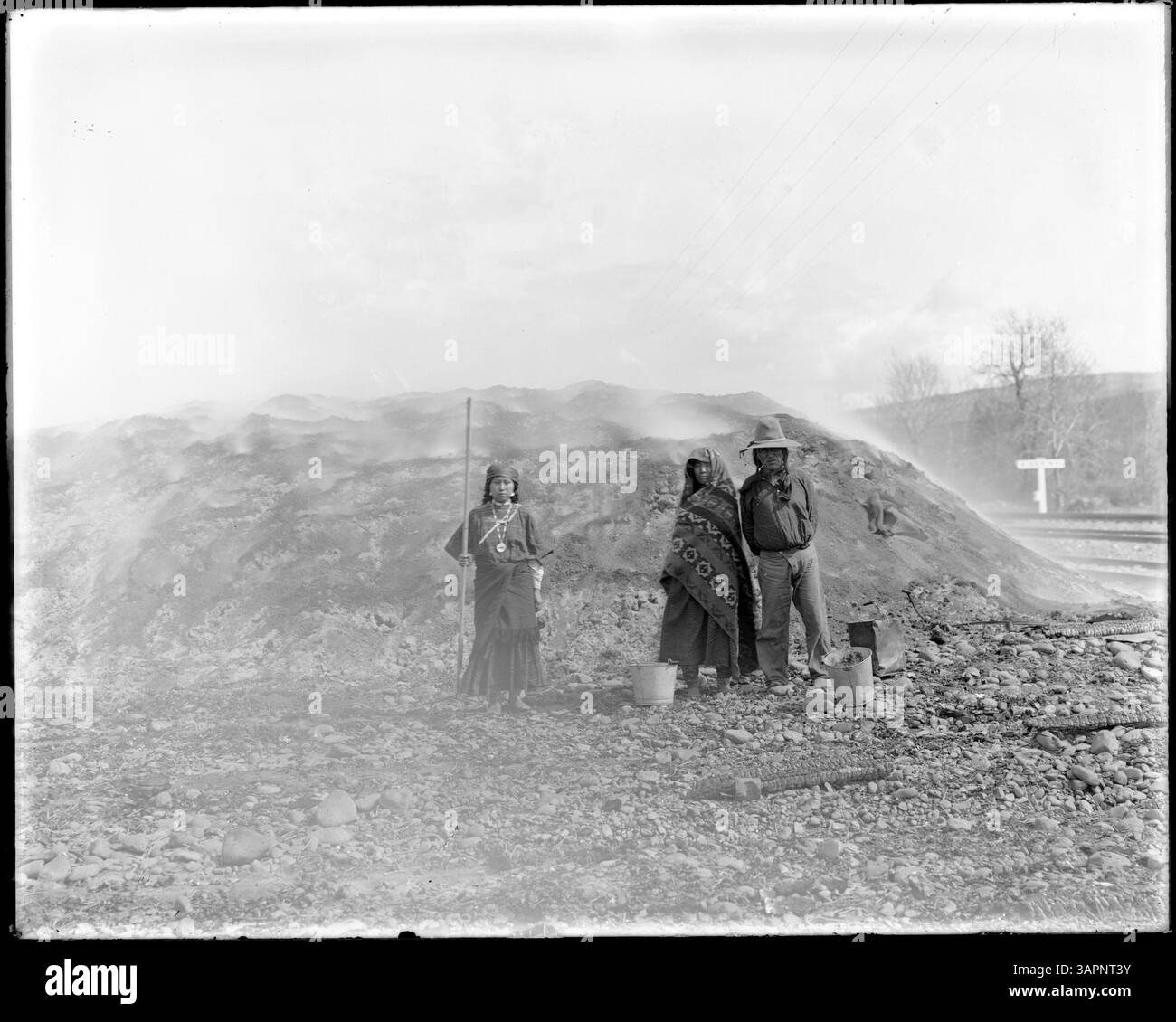 This photograph by Lee Moorhouse captures a Native American man and two ...