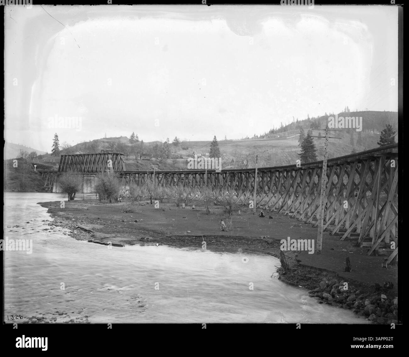 Photograph of a railroad and highway bridge over the Hood River, near ...