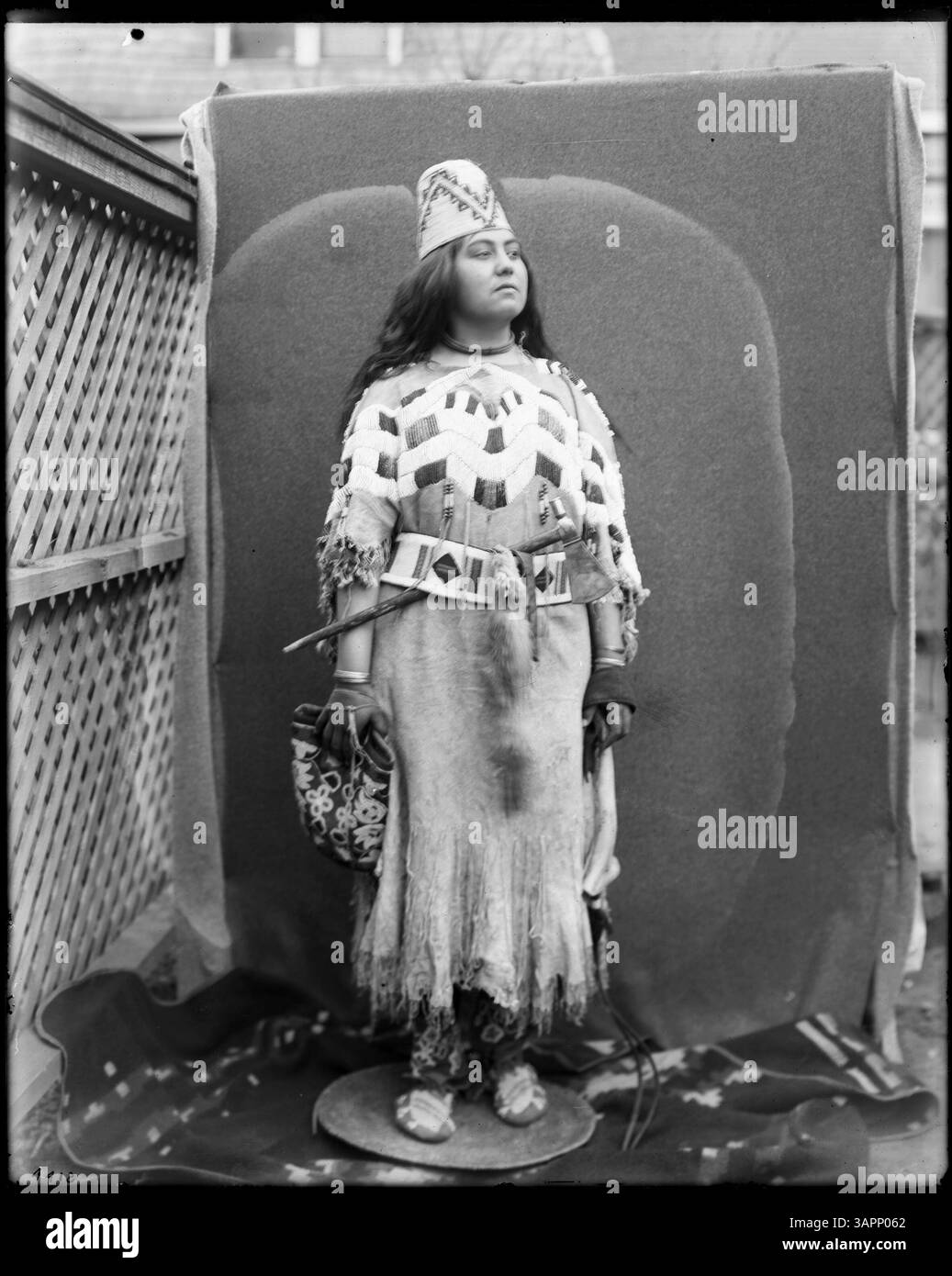 Portrait of Lou French, a Walla Walla Indian, dressed in regalia and ...