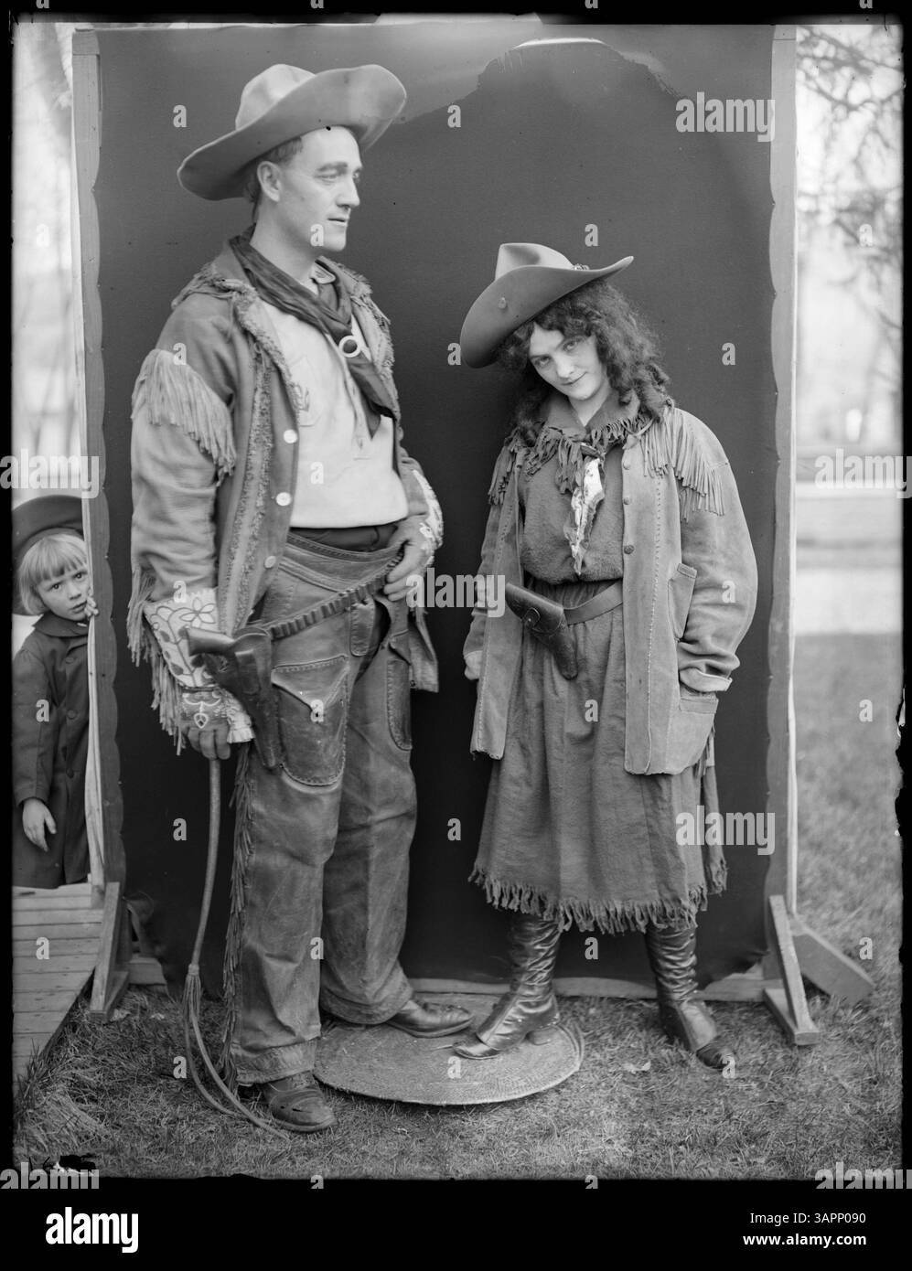 This photograph by Lee Moorhouse features Tom Lowe and his wife dressed ...