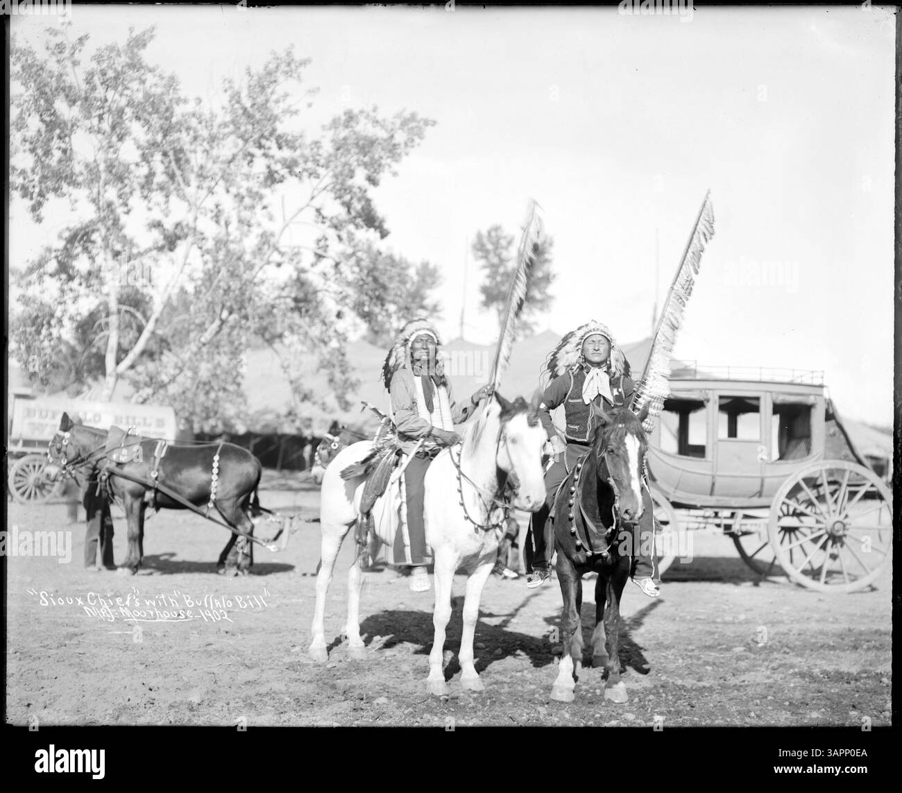 Photograph by Lee Moorhouse of two Sioux Chiefs in tribal attire, on ...