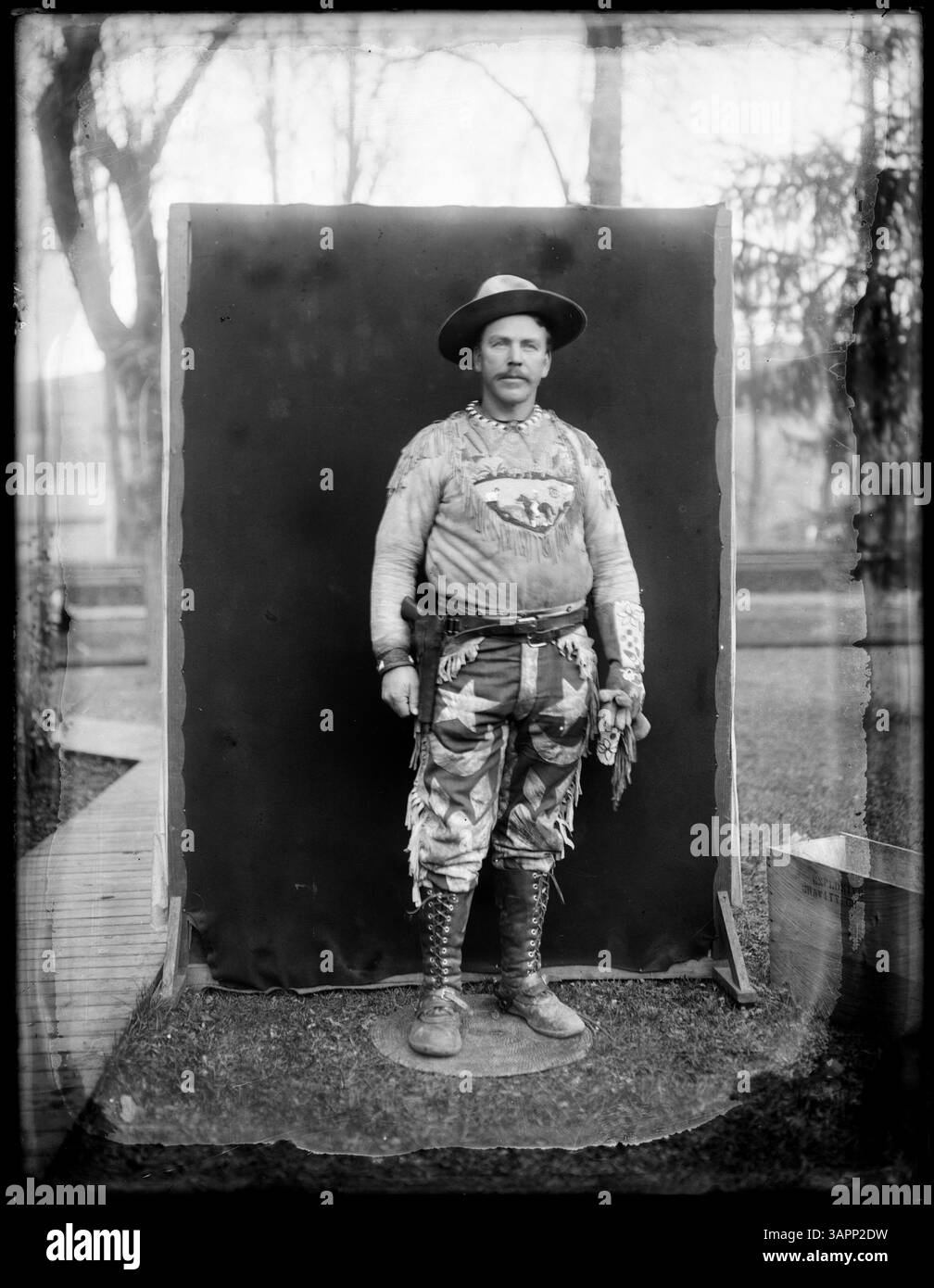 This photograph by Lee Moorhouse depicts a cowboy, likely from the ...