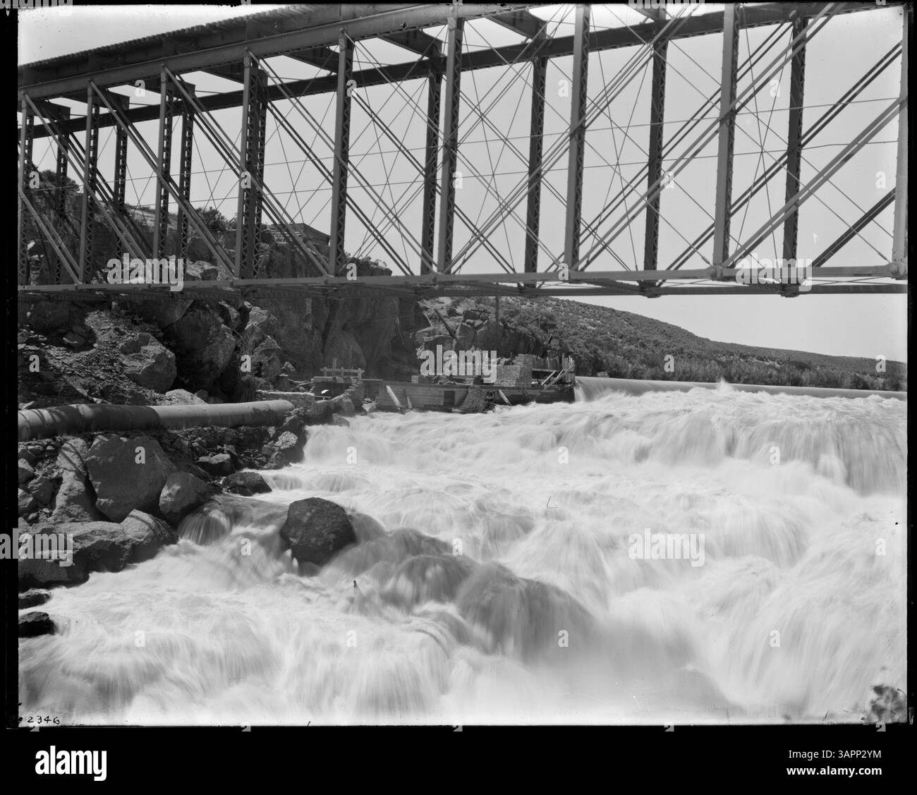 Photograph by Lee Moorhouse of a bridge over the Columbia River below ...
