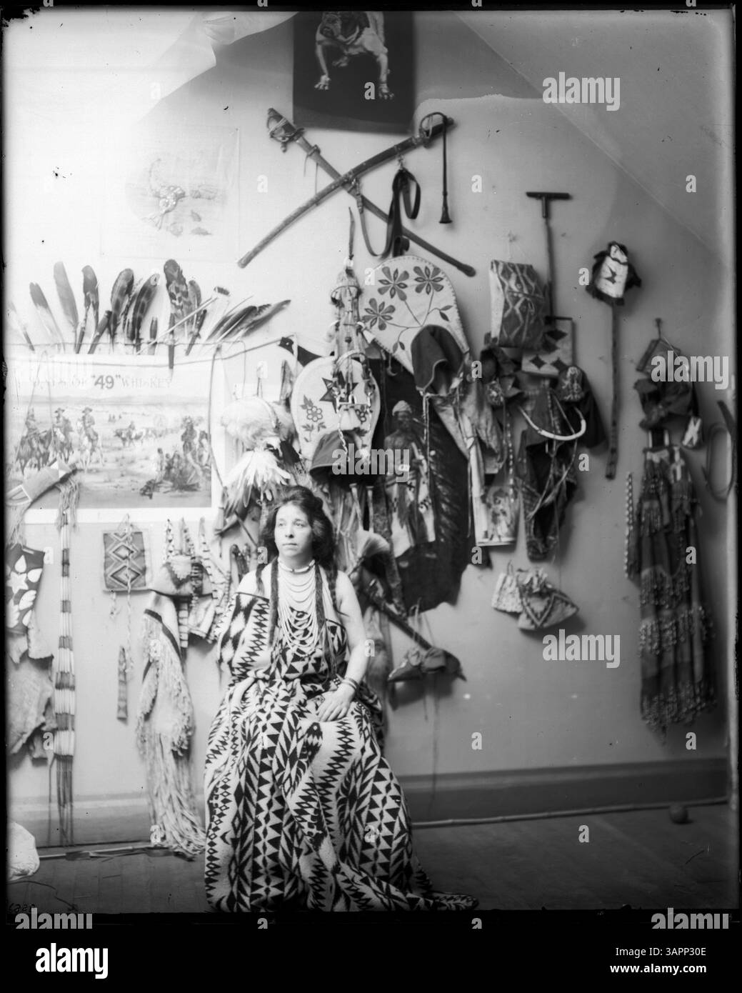 A collection of Native American regalia and artifacts photographed by ...