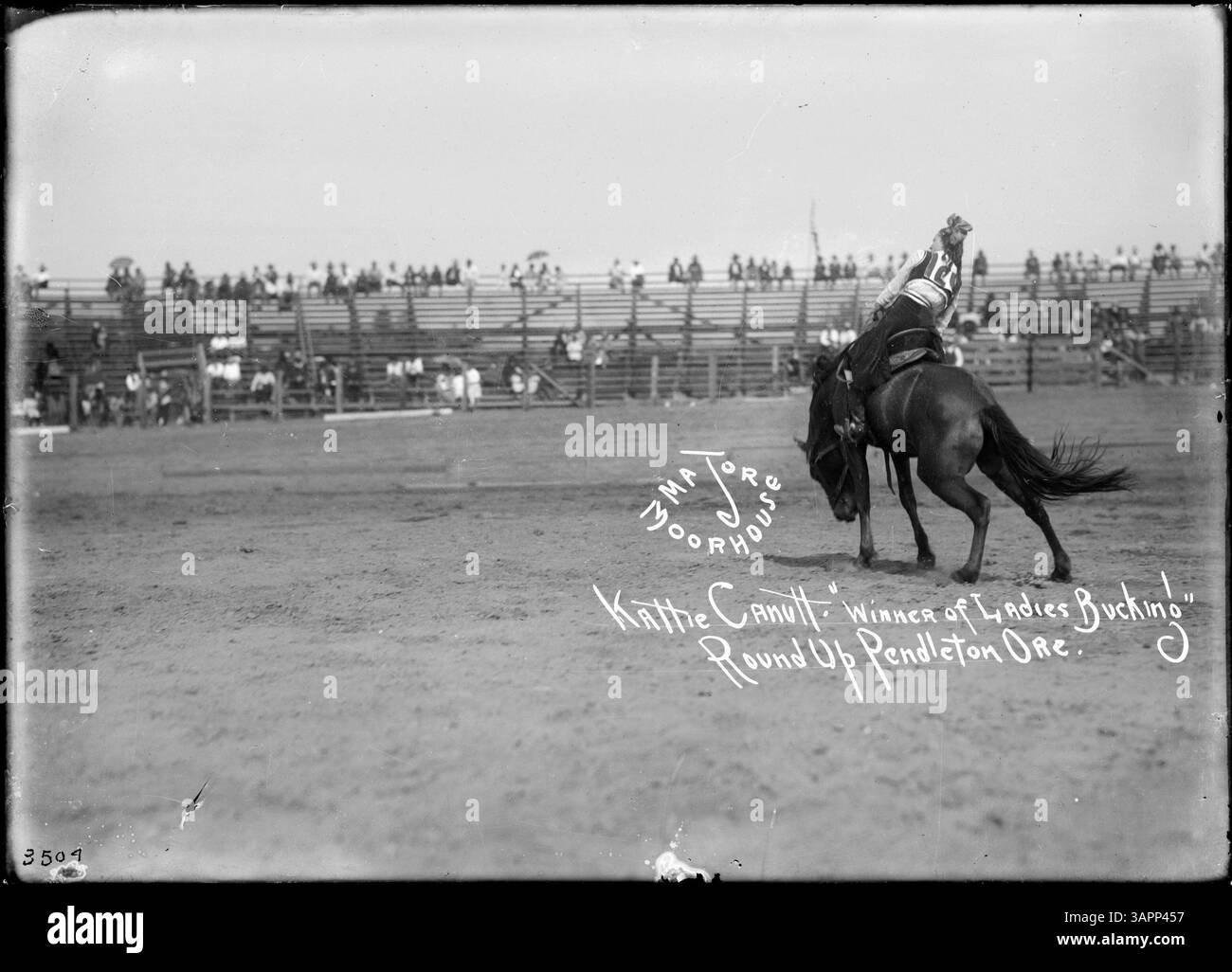 Lee Moorhouse captured an image of Katie Canutt riding a bucking horse ...