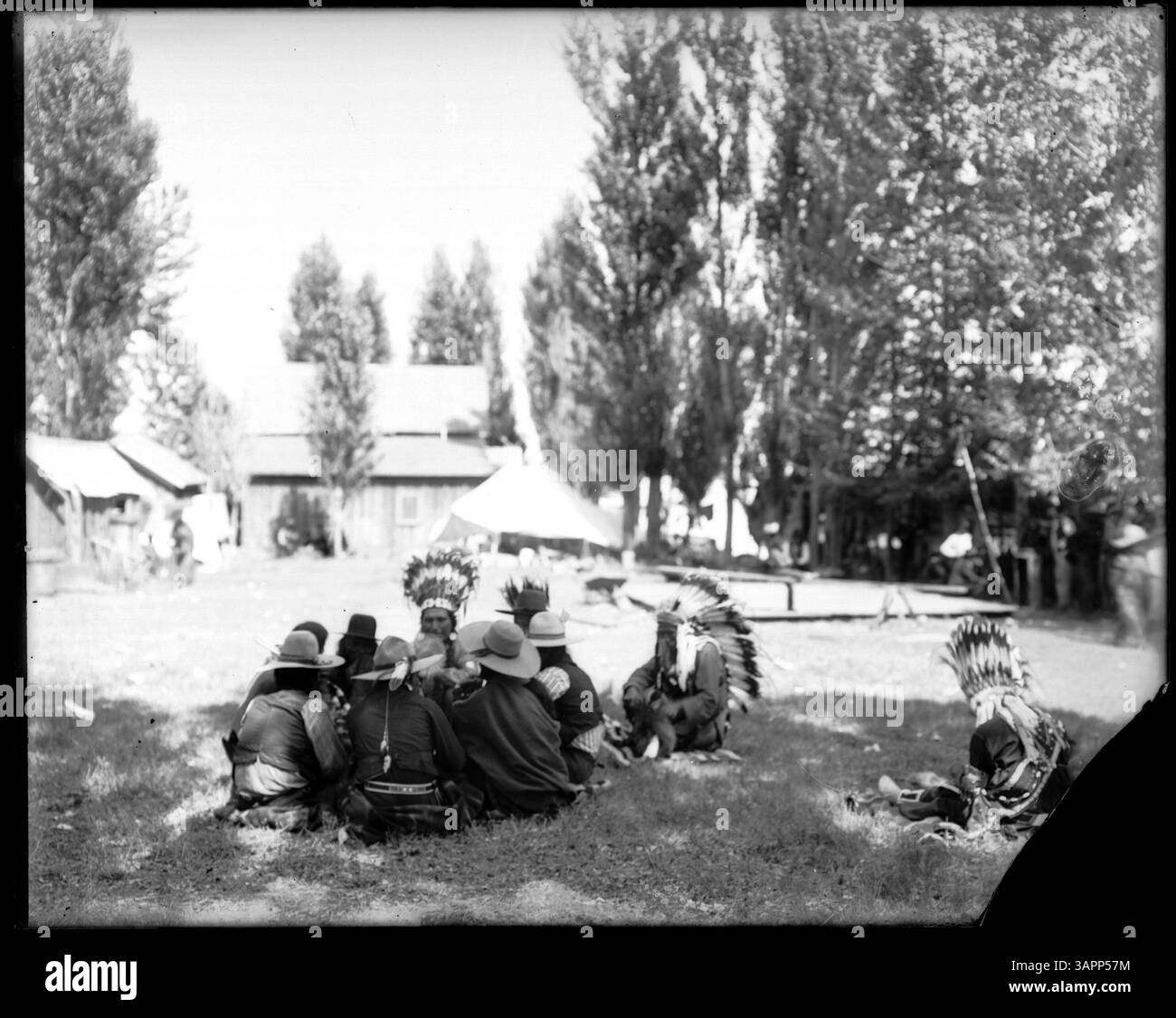 A photograph by Lee Moorhouse showing a group of Native Americans ...