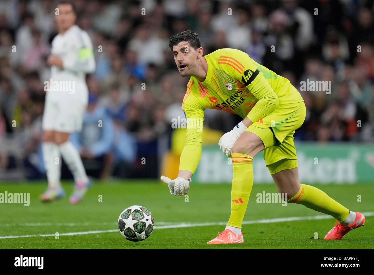 Real Madrid's goalkeeper Thibaut Courtois passes the ball during the ...