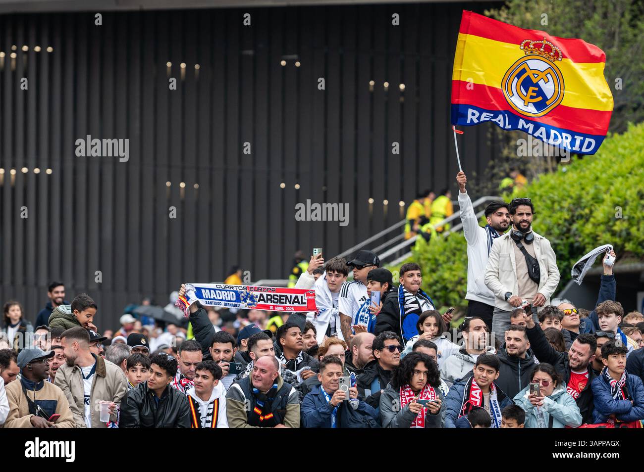Madrid, Spain. 16th Apr, 2025. Real Madrid fans wave flags outside ...