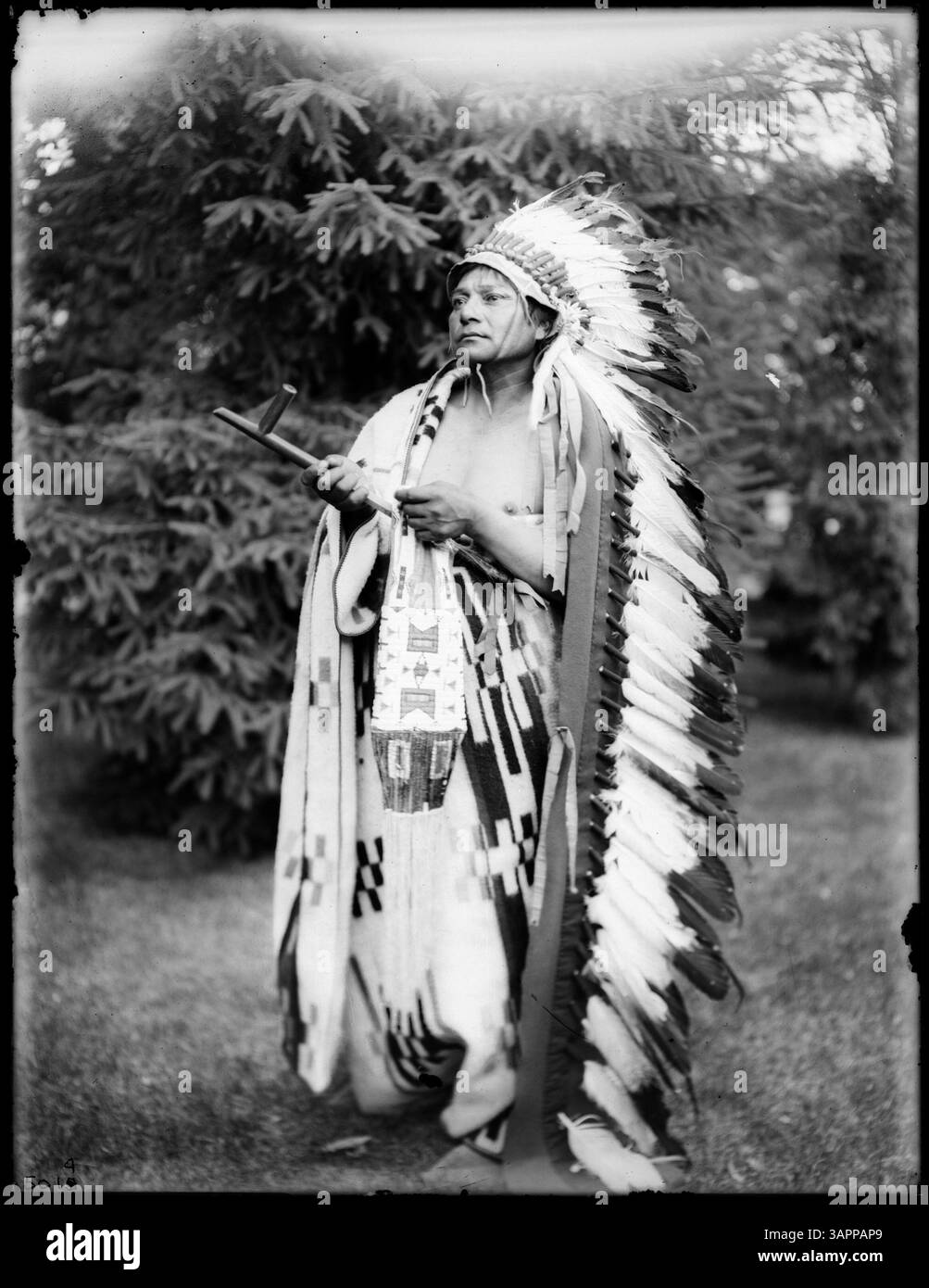 John Liberty, an Umatilla Indian, is photographed wearing a feather ...