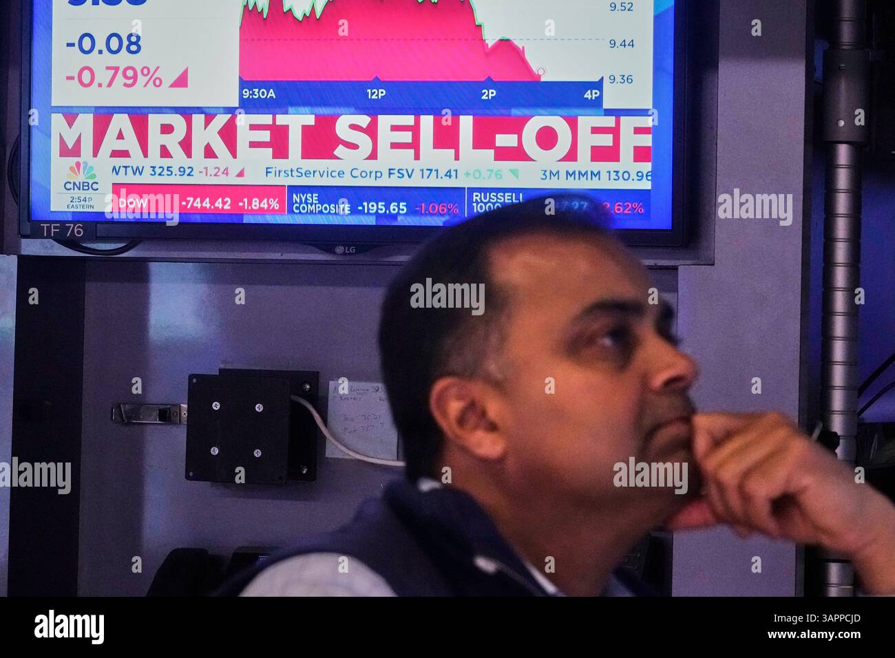 Specialist Dilip Patel works at his post on the floor of the New York ...