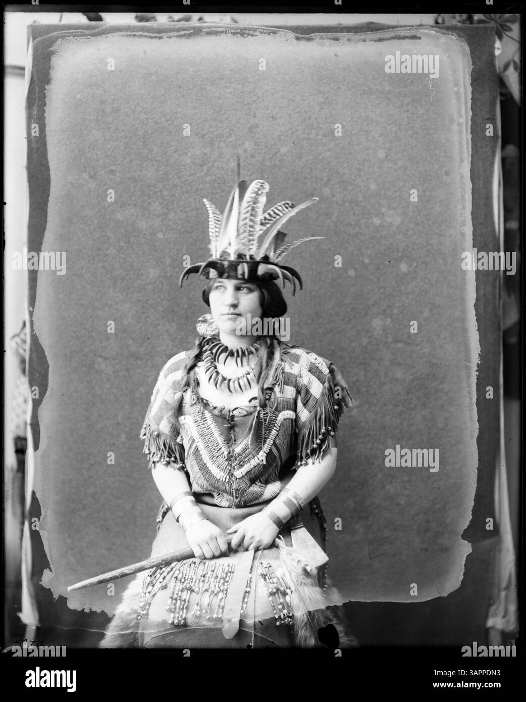 This photograph captures Esther Umahollis, an Umpqua tribal woman, in ...