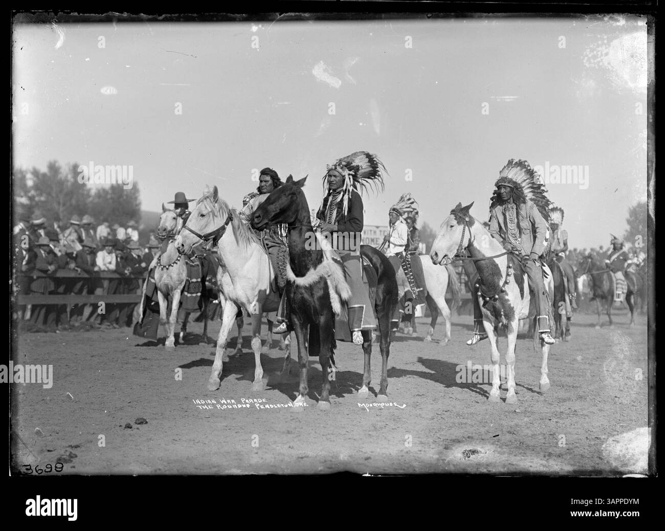 This photograph depicts tribal people at a Roundup, continuing to ...