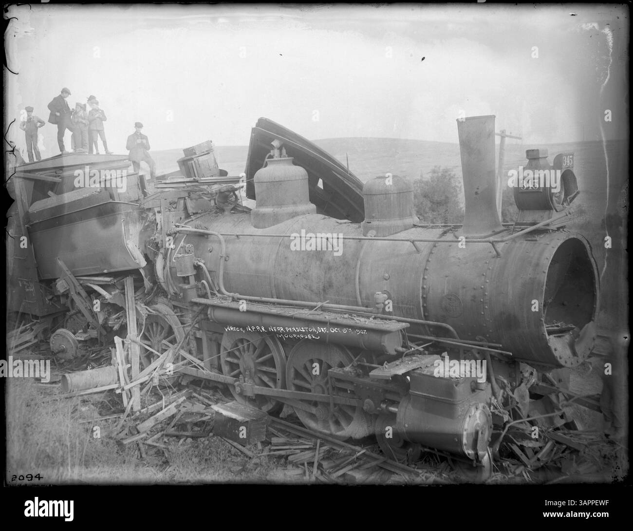 The photograph depicts the wreck of engines no. 345 and 366 of the N.P ...