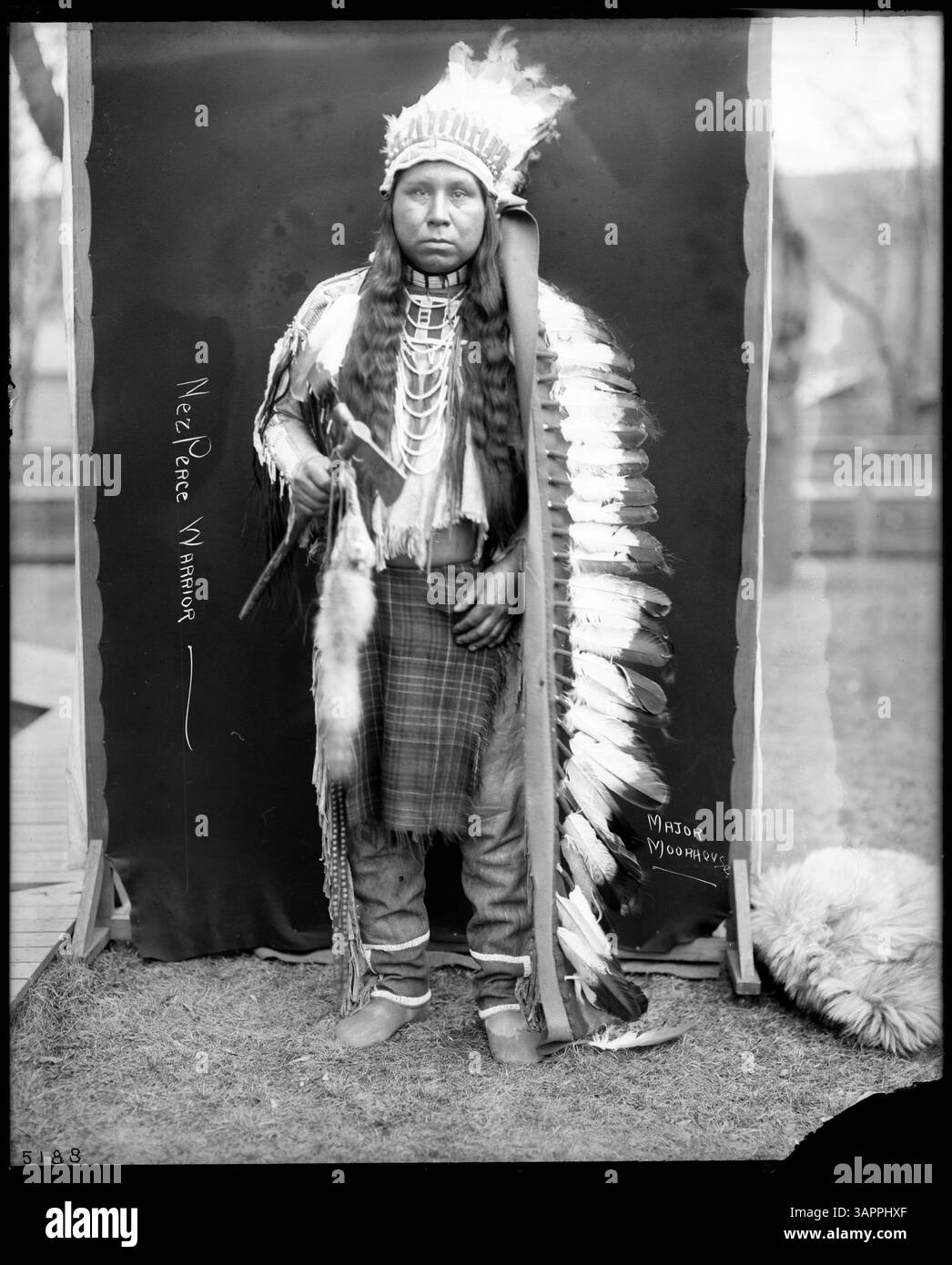 Nez Perce man in war bonnet, photographed in various poses Stock Photo ...