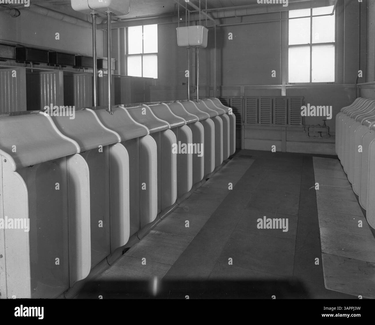 The Grant School Boys' Restroom features modern sanitary toilets ...
